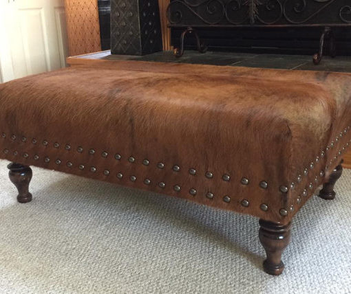 Cowhide Ottoman - Rustic Artistry